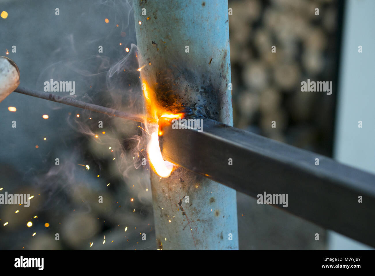 worker welding metal elements on site,image of a Stock Photo - Alamy