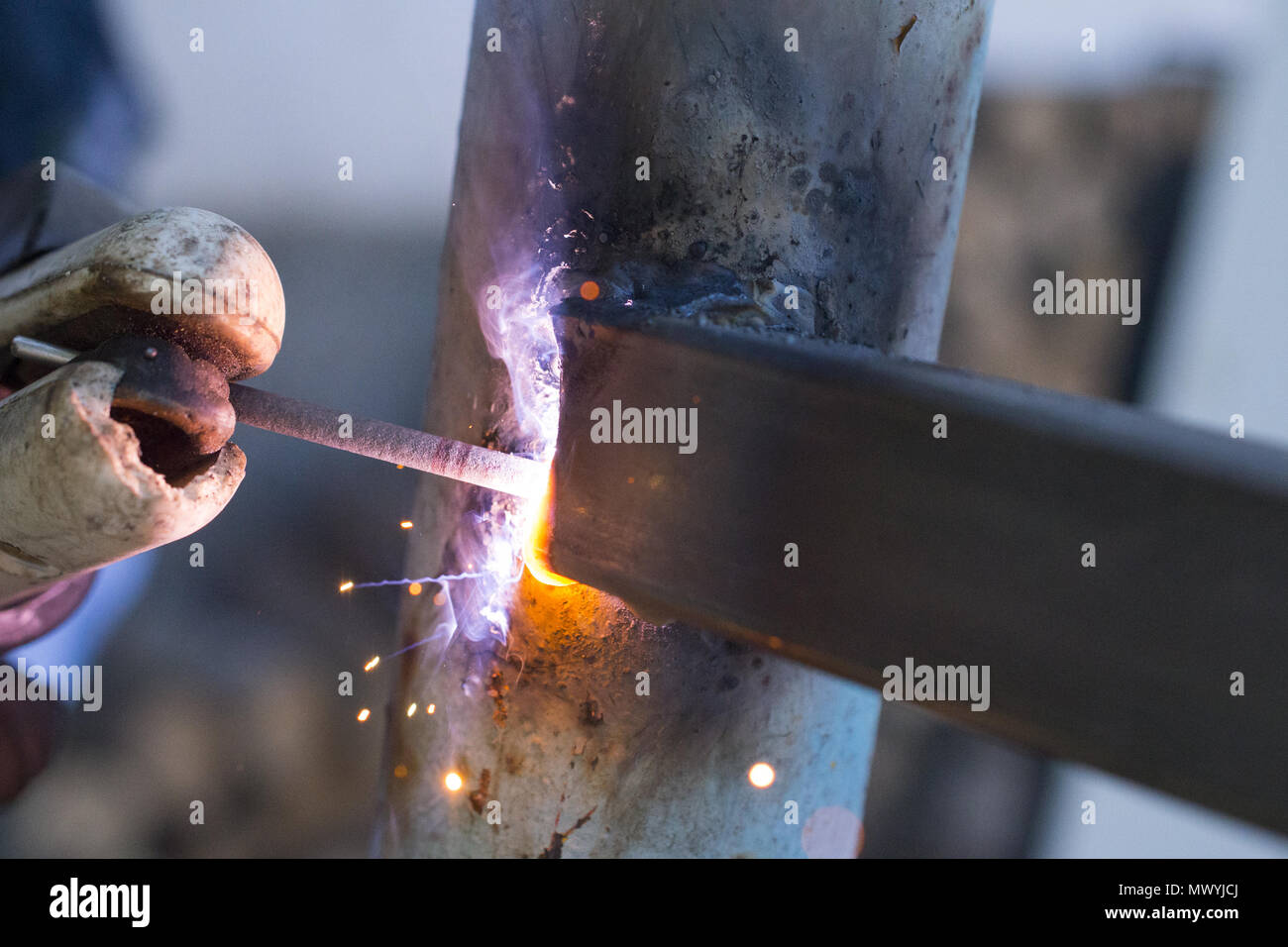 worker welding metal elements on site,image of a Stock Photo - Alamy