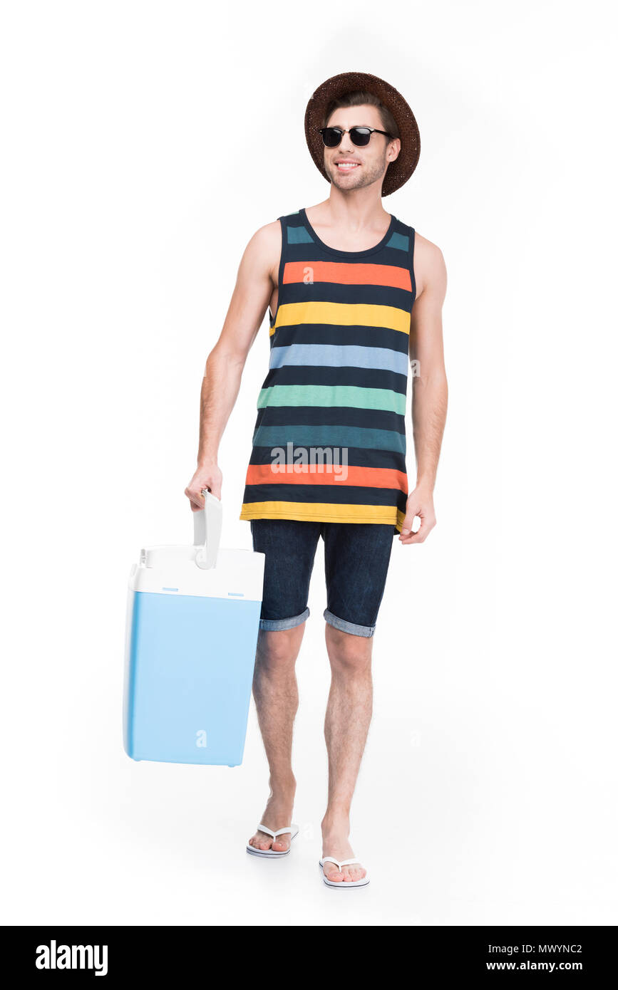 smiling man in summer hat holding cooler box, isolated on white Stock ...