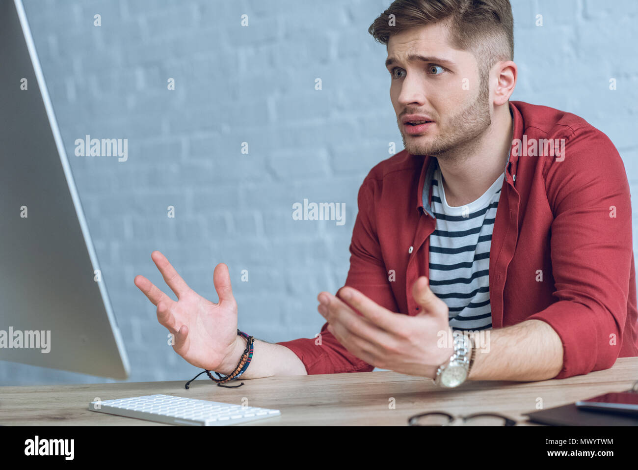 Young stressed freelance man hi-res stock photography and images - Alamy