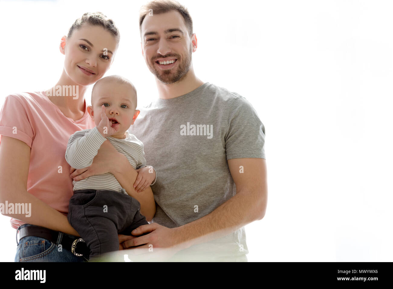 happy family with infant son, isolated on white Stock Photo - Alamy