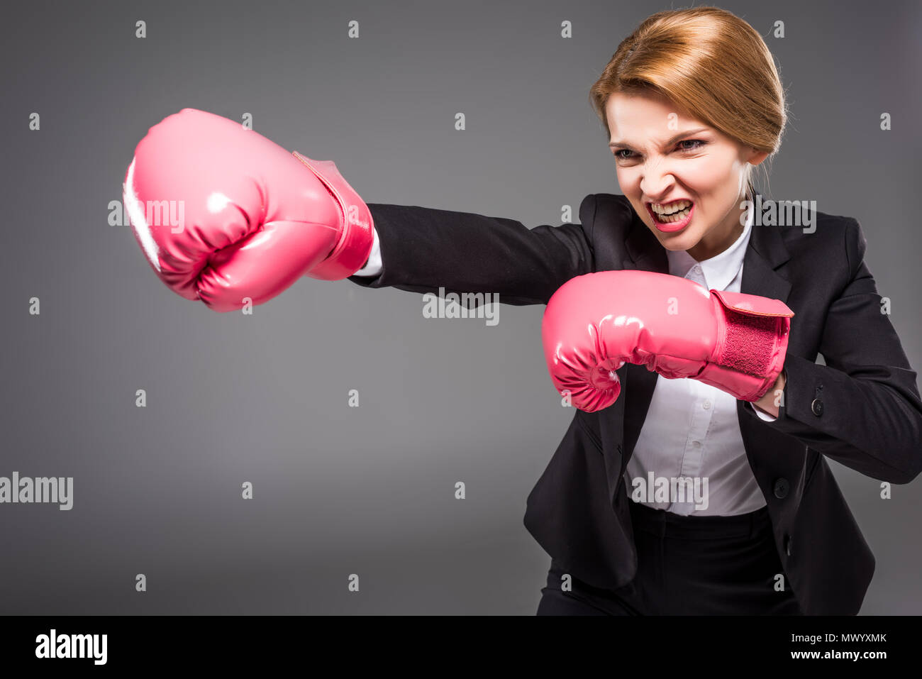 Angry business woman boxing gloves hi-res stock photography and images ...
