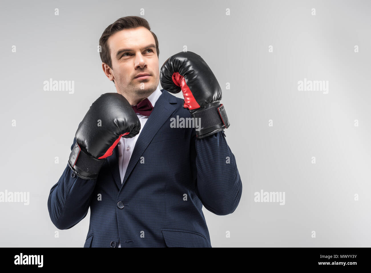 Man in suit wearing boxing hi-res stock photography and images - Alamy