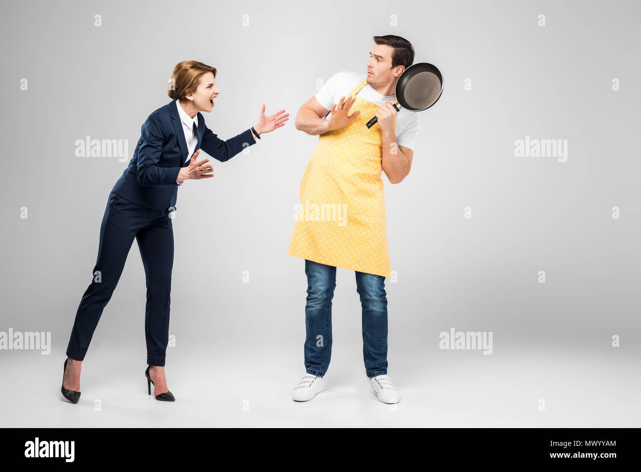 businesswoman yelling at scared husband with frying pan, feminism ...