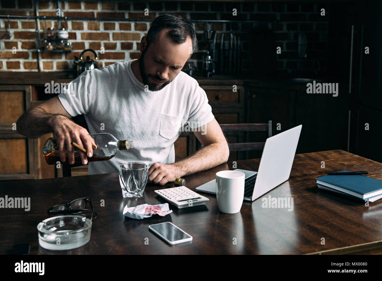 Man pouring whiskey drink on hi-res stock photography and images - Alamy