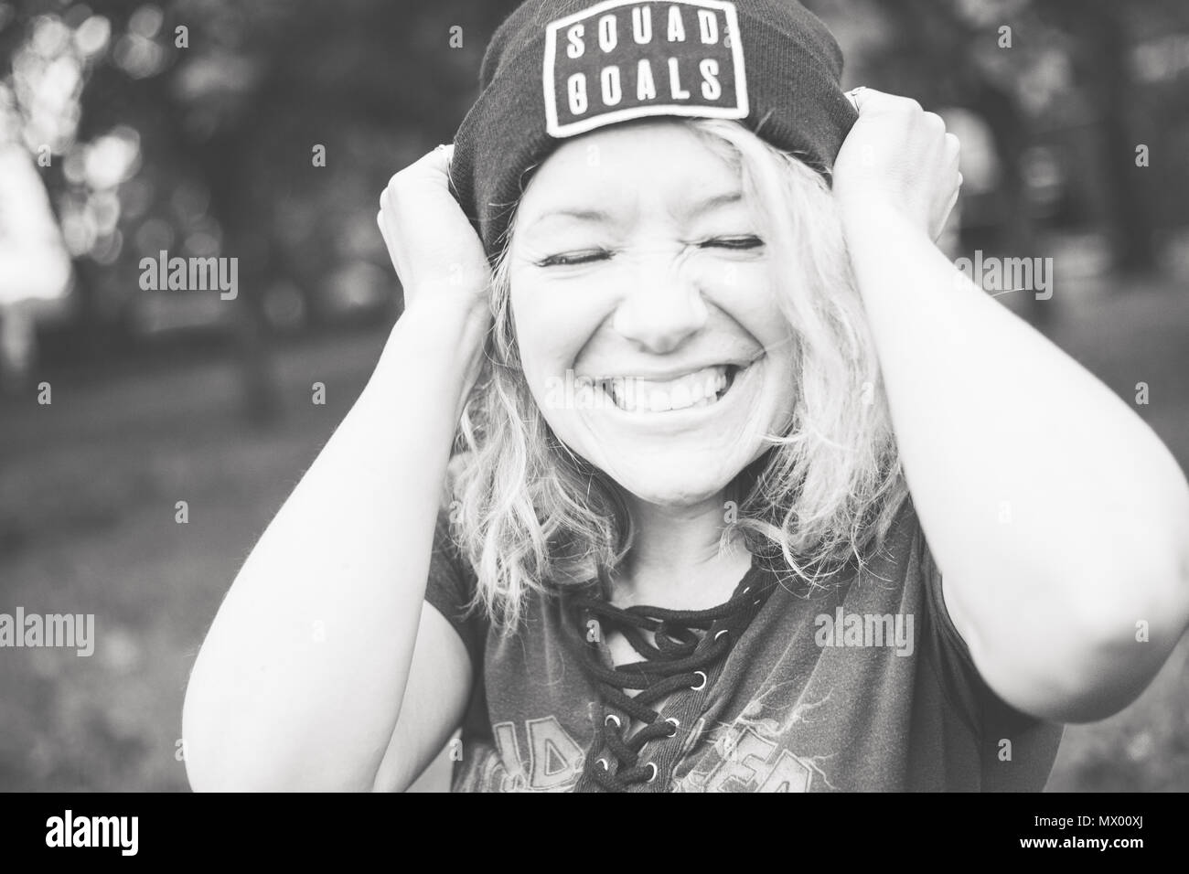 Young white british woman smiling and looking excited Stock Photo - Alamy Young white british woman smiling and looking excited Stock Photo - Alamy