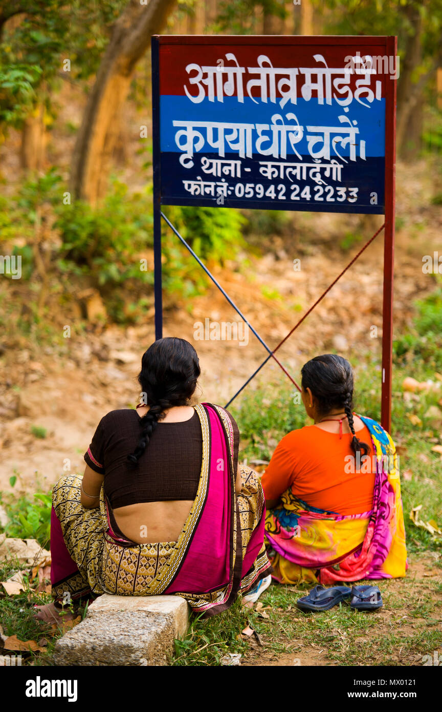 Indian womans resting on the Kaladhungi-Naini Tal road in the late ...