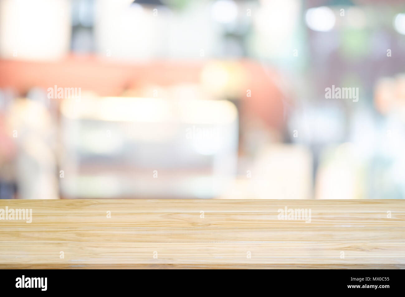 Wood table with kitchen room blur background Stock Photo - Alamy