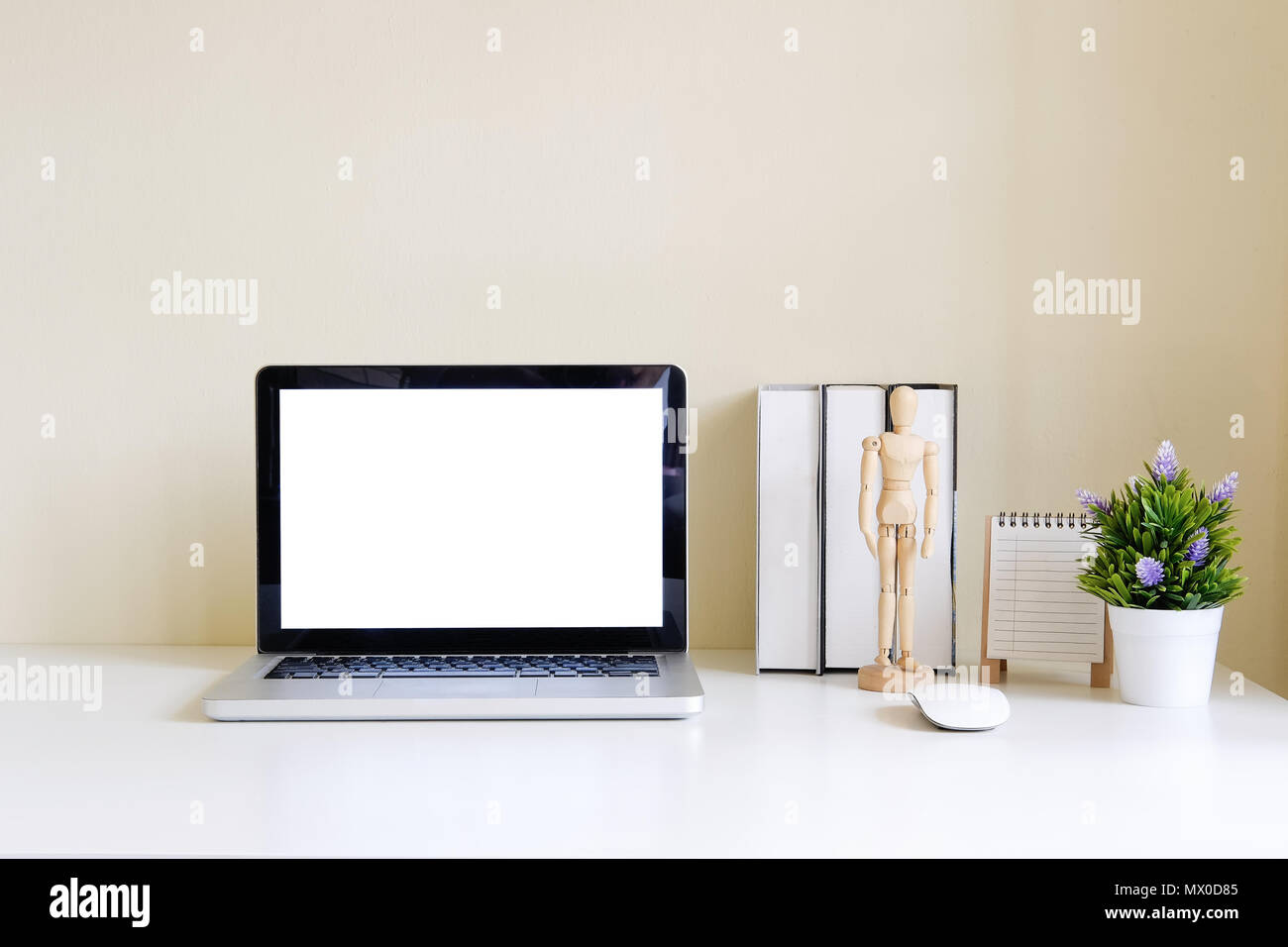 Mockup blank screen computer laptop on desk. Workspace with laptop and ...