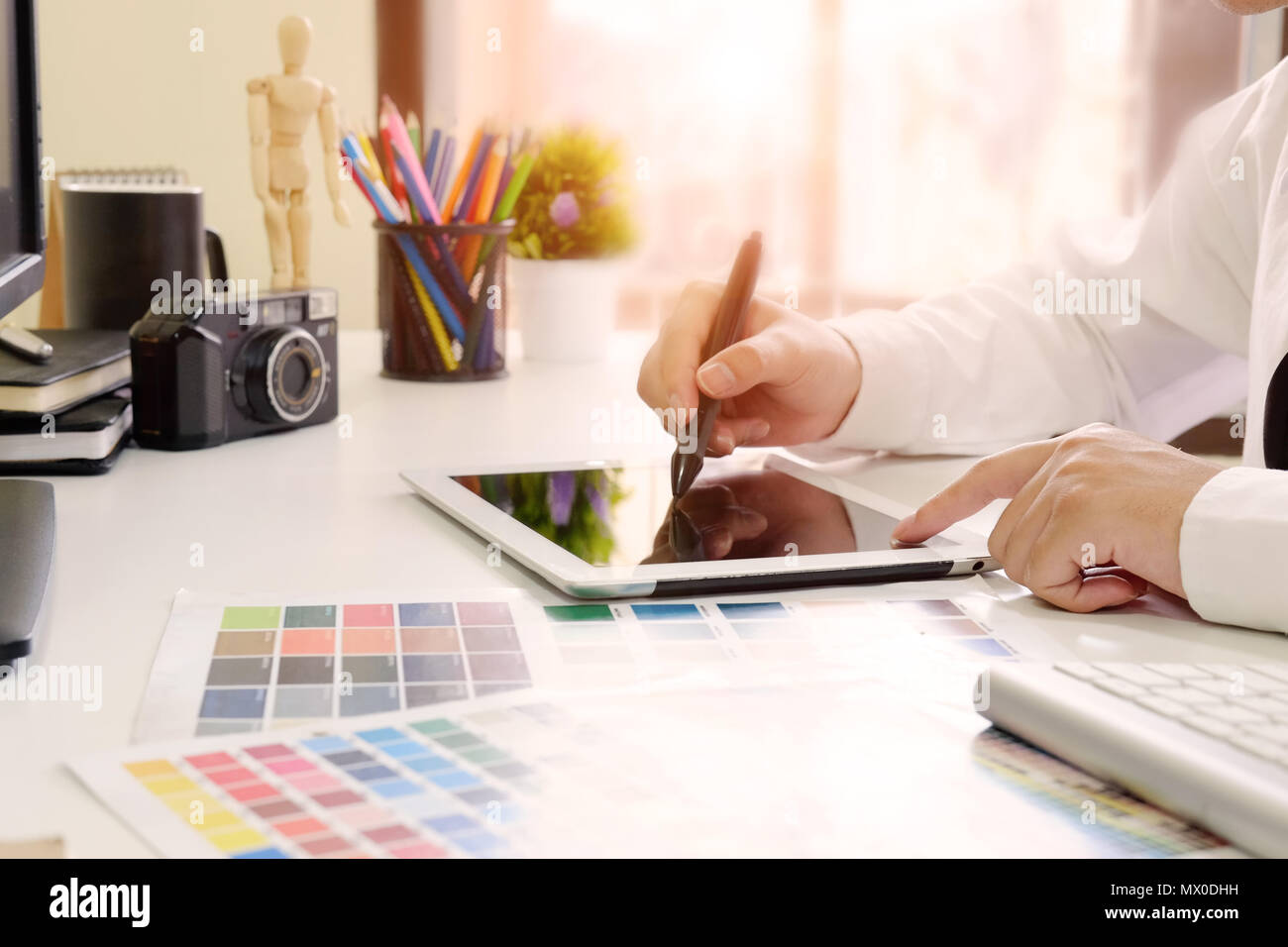 Graphic designer working with digital tablet cropped shot photo Stock ...