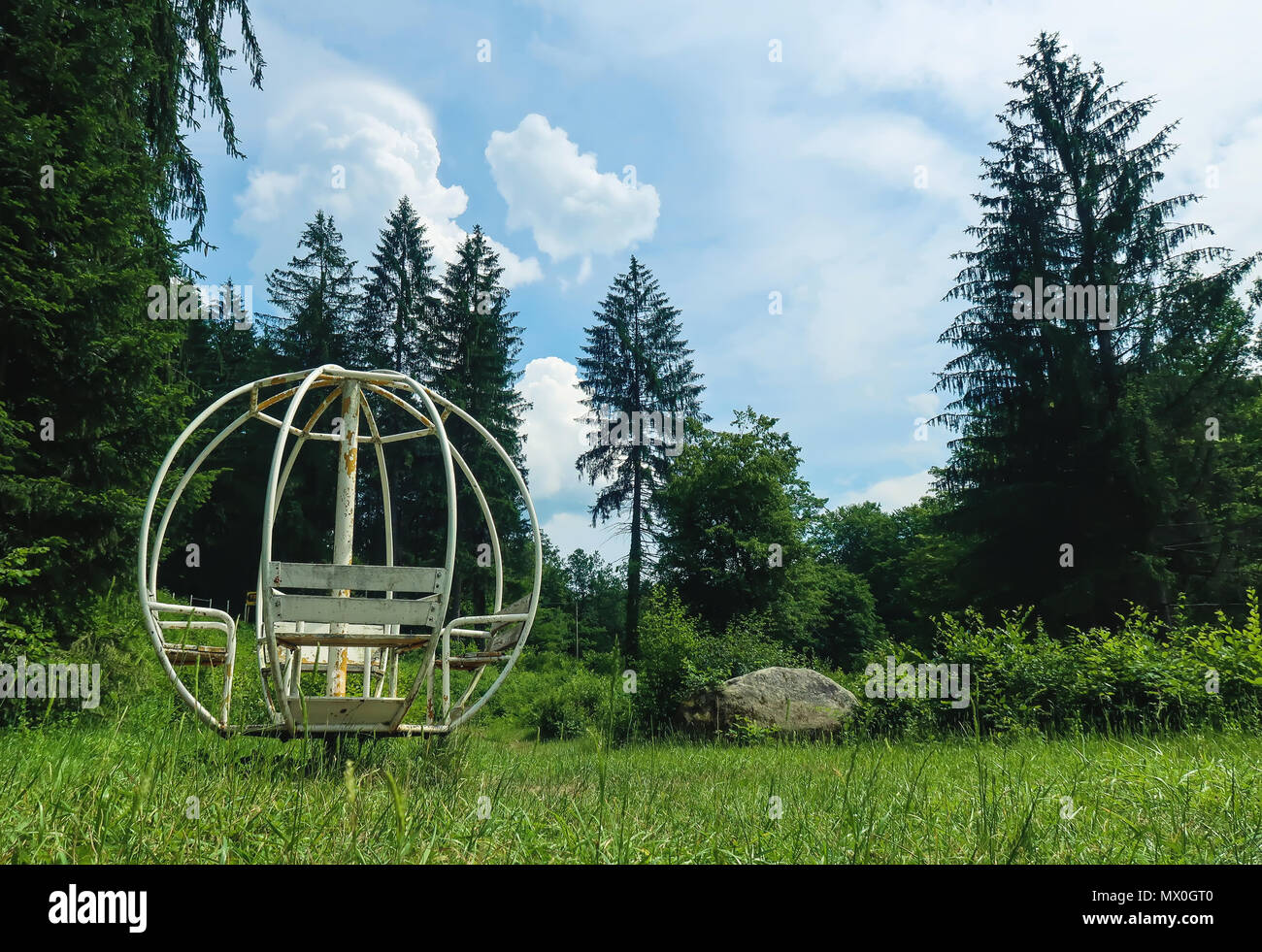 Abandoned merry-go-round in nature Stock Photo - Alamy