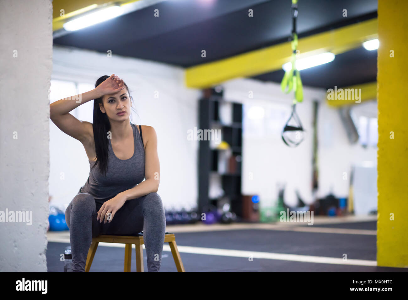 Athletic woman relaxing after cross hi-res stock photography and images ...