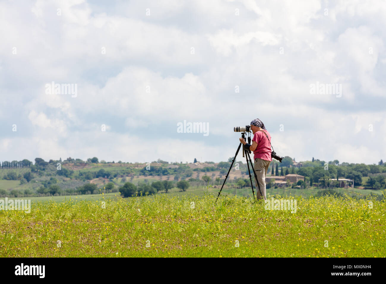 Standing over camera hi-res stock photography and images - Alamy