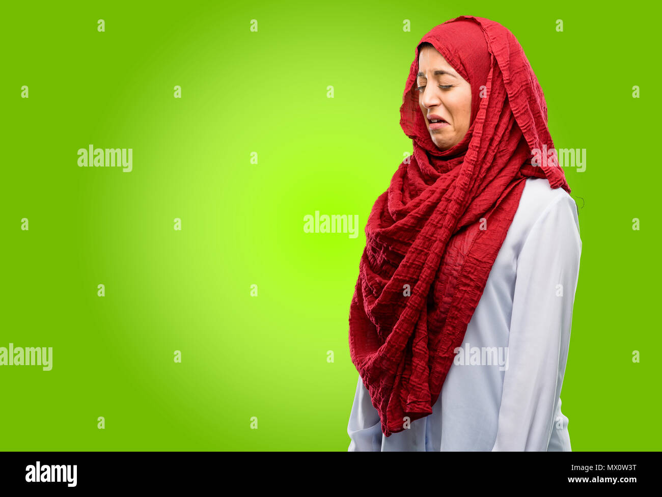 Young Arab Woman Wearing Hijab Crying Depressed Full Of Sadness Expressing Sad Emotion Stock
