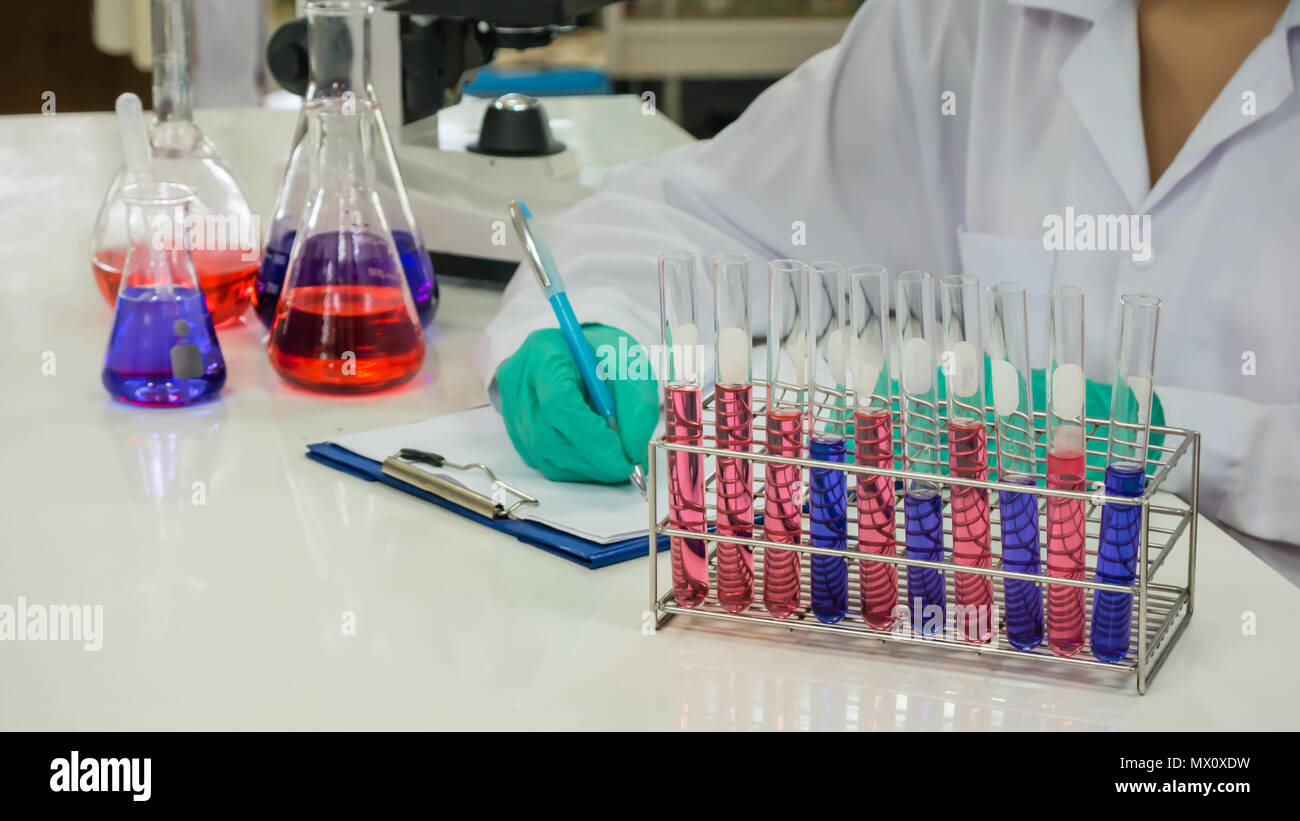 scientist with equipment and science experiments in laboratory Stock ...