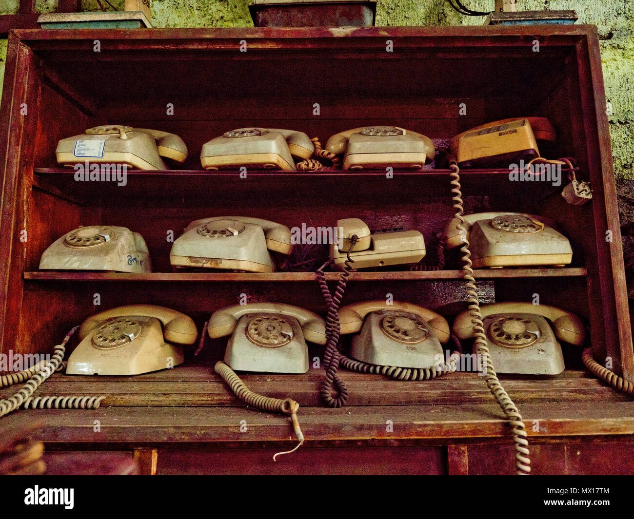 Antique street shop with old telephones in Bali Stock Photo - Alamy