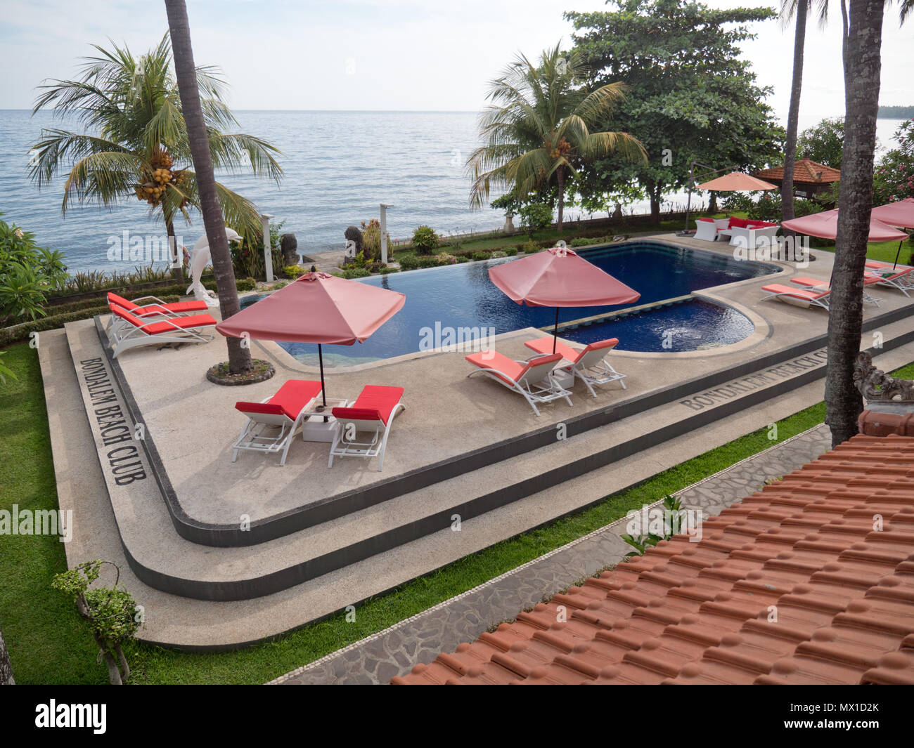 Luxury hotel,resort near at sea with pool among the palm trees ...