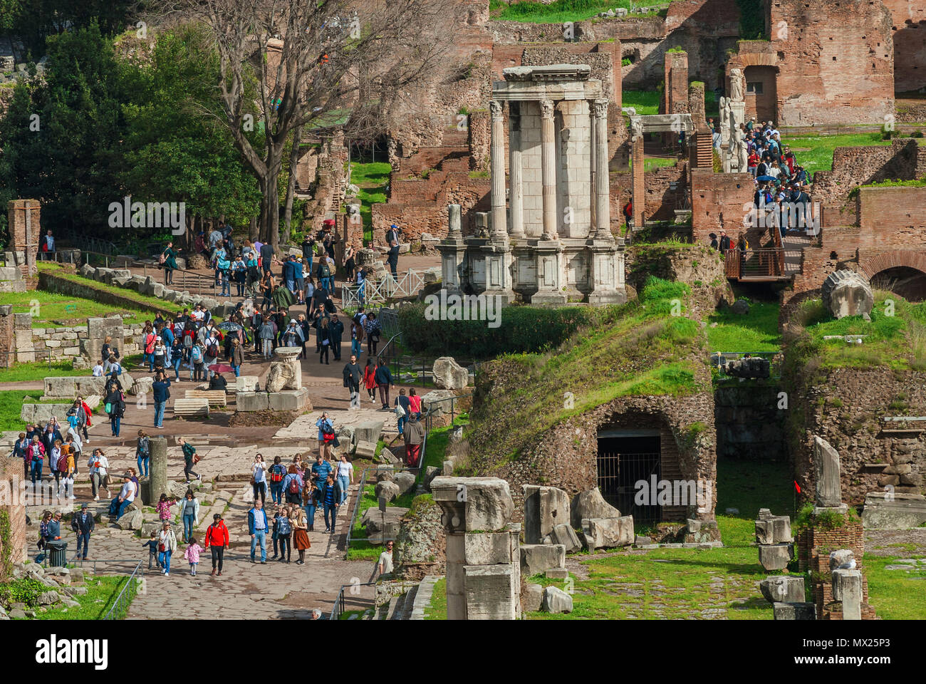 Tourists walking along the Via Sacra (Sacred Road) in Roman Forum ...