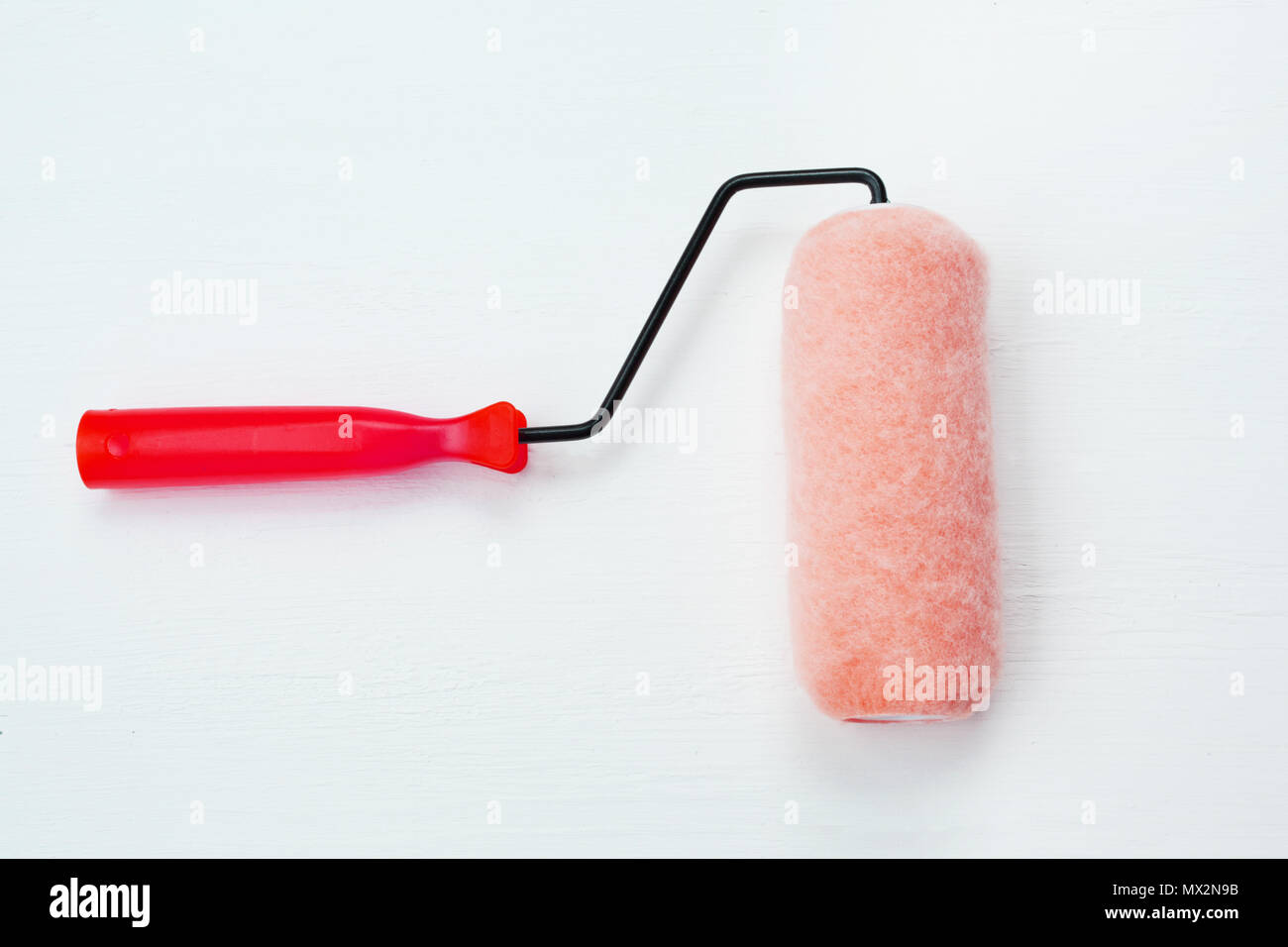 Paint roller isolated on white background Stock Photo - Alamy