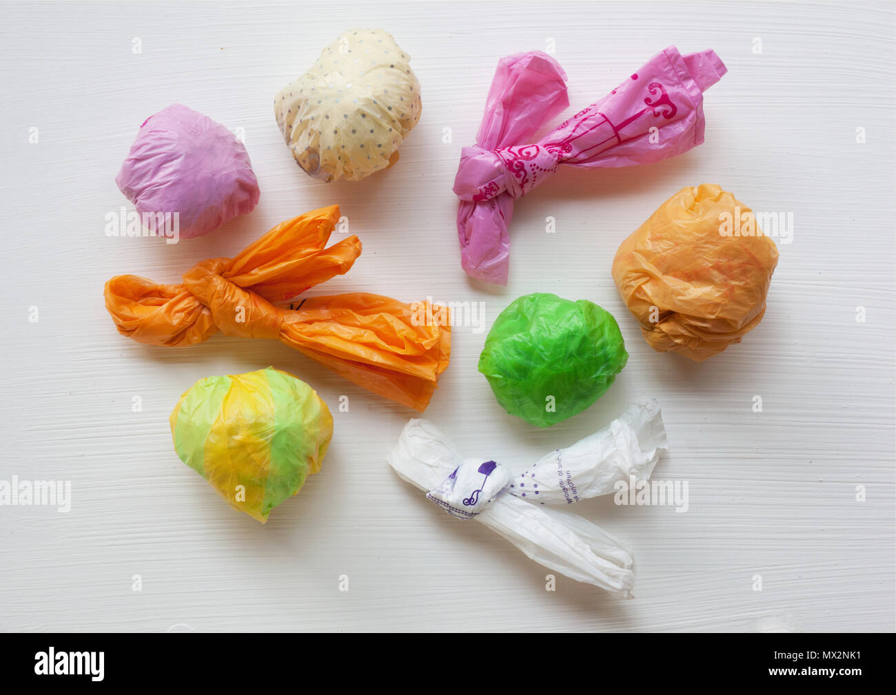 Colorful crumpled plastic bag on white background Stock Photo - Alamy