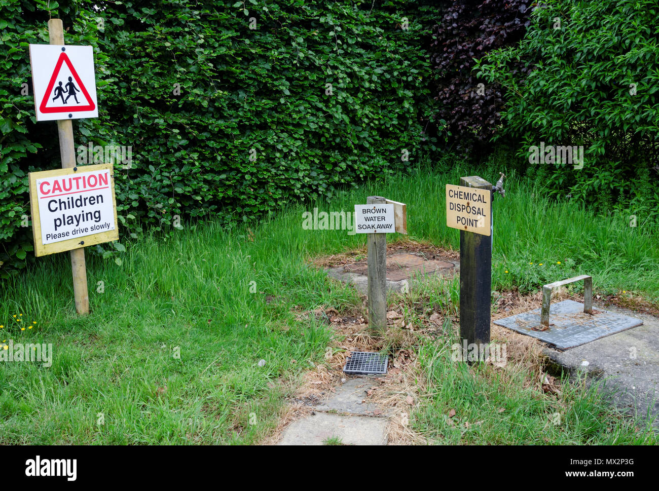 Chemical toilet and grey waste disposal point on a camp site with a ...
