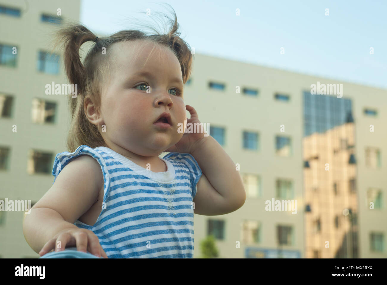 Portrait of a little hurt girl outdoors in summer day Stock Photo - Alamy