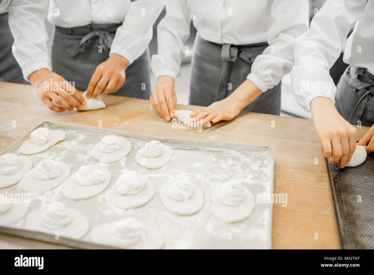 Close up hands forming dough hi-res stock photography and images - Alamy