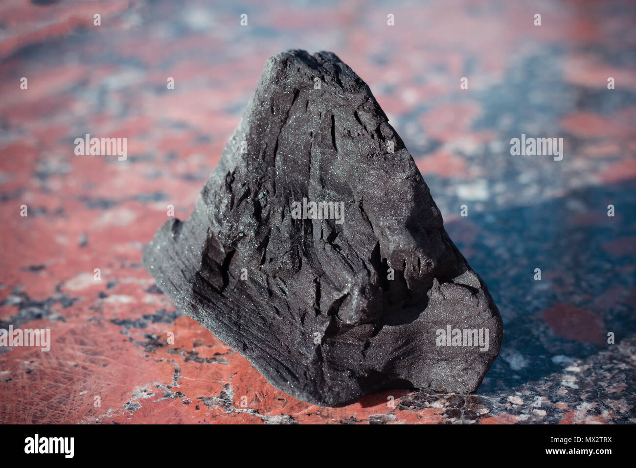 coal on a granite stone, the concept of heat and energy, close-up Stock ...