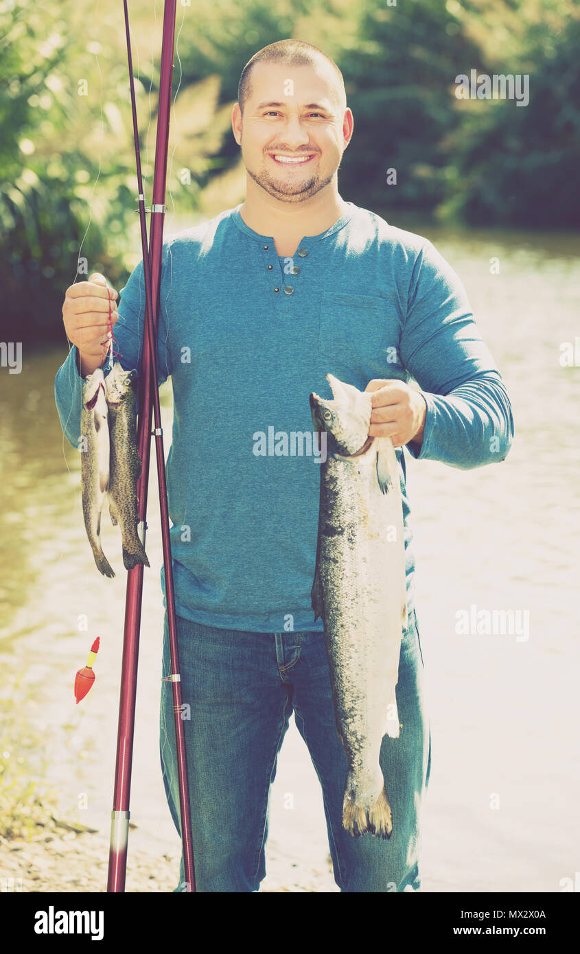 Posing with fish hi-res stock photography and images - Alamy