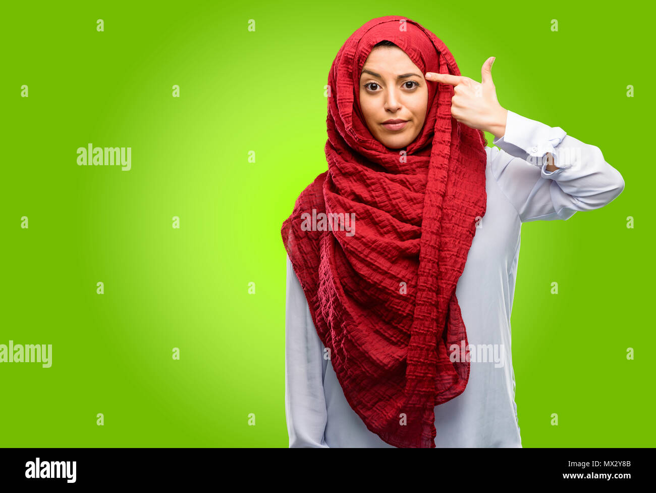 Muslim woman with gun hi-res stock photography and images - Alamy