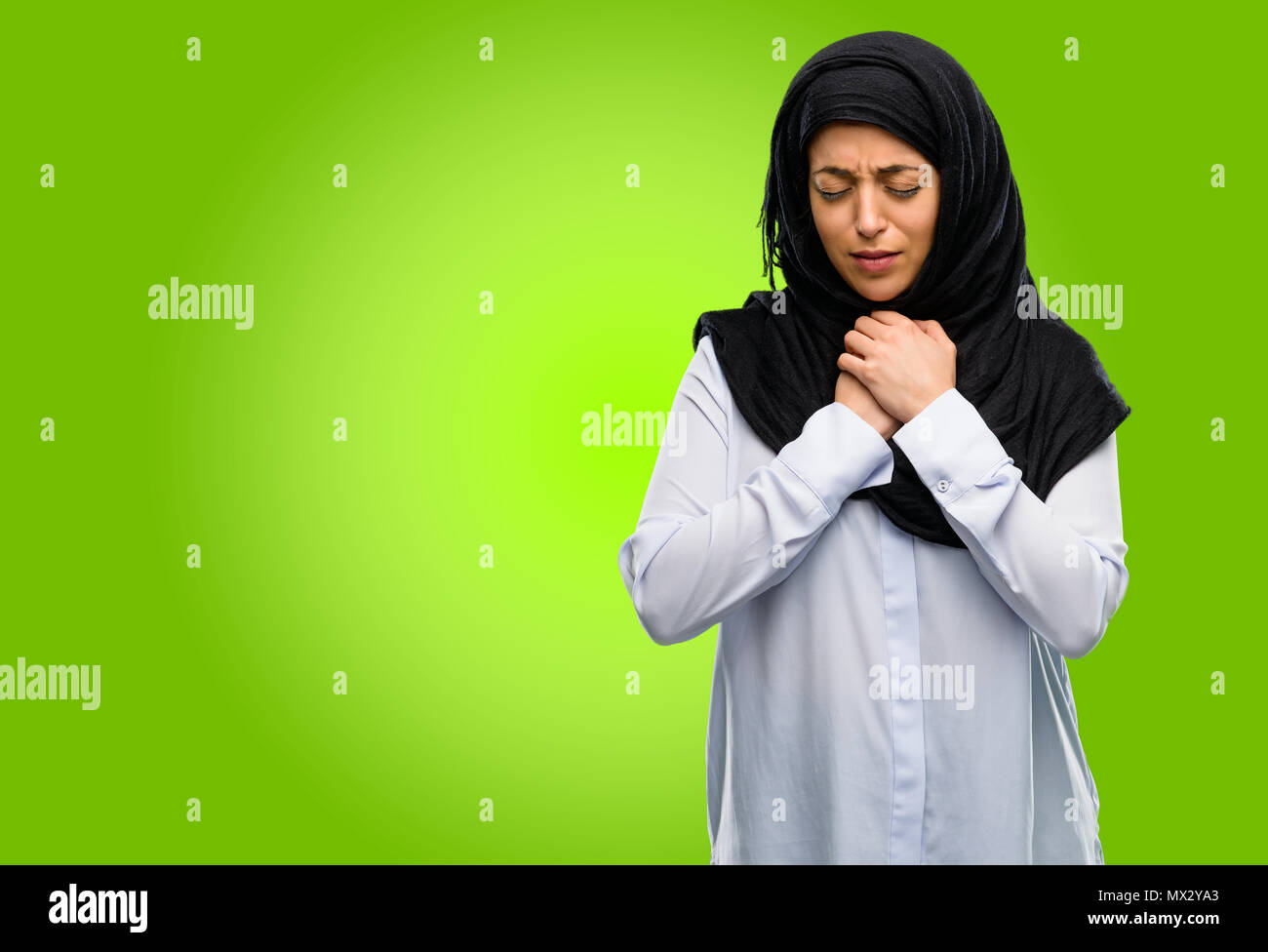 Young Arab Woman Wearing Hijab Crying Depressed Full Of Sadness Expressing Sad Emotion Stock