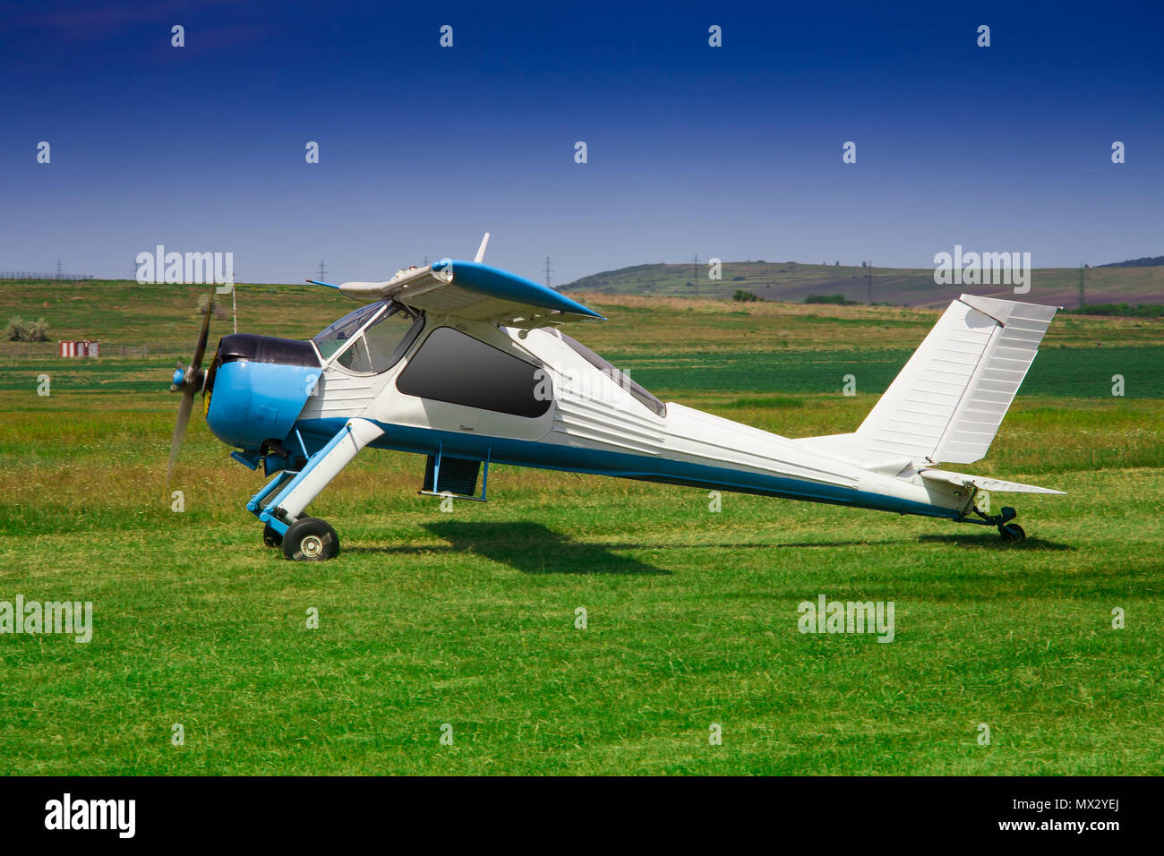 small airplane ready to take off on the airfield Stock Photo - Alamy