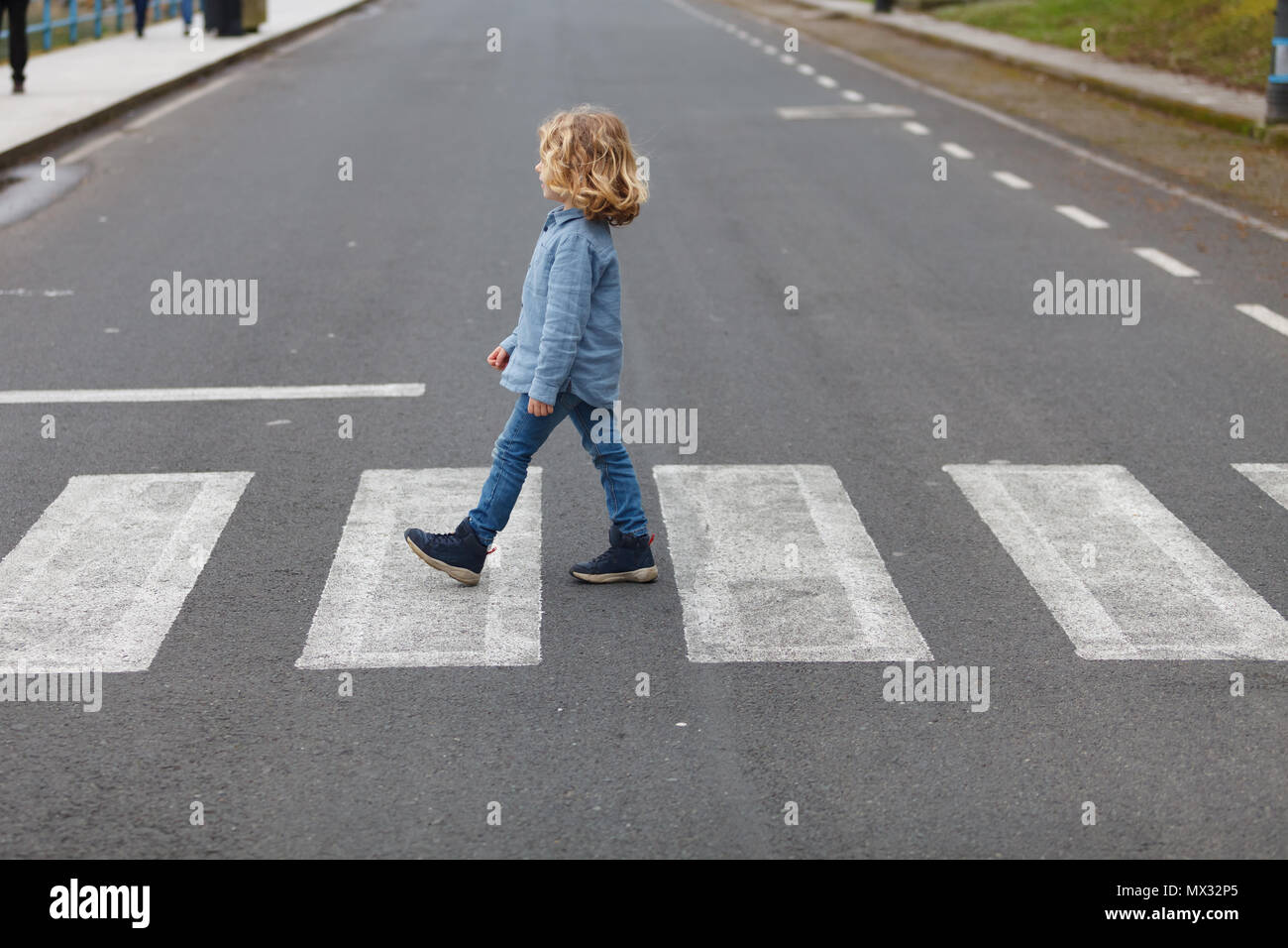 Kids cross street at crosswalk hi-res stock photography and images - Alamy
