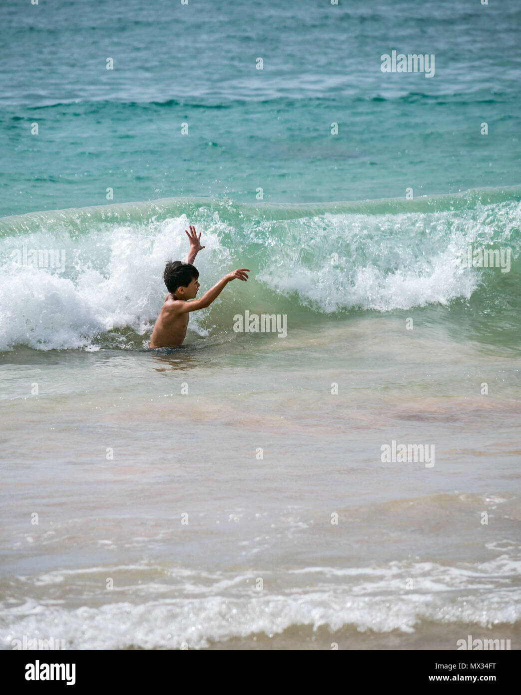 Wave breaking on the beach hi-res stock photography and images - Alamy
