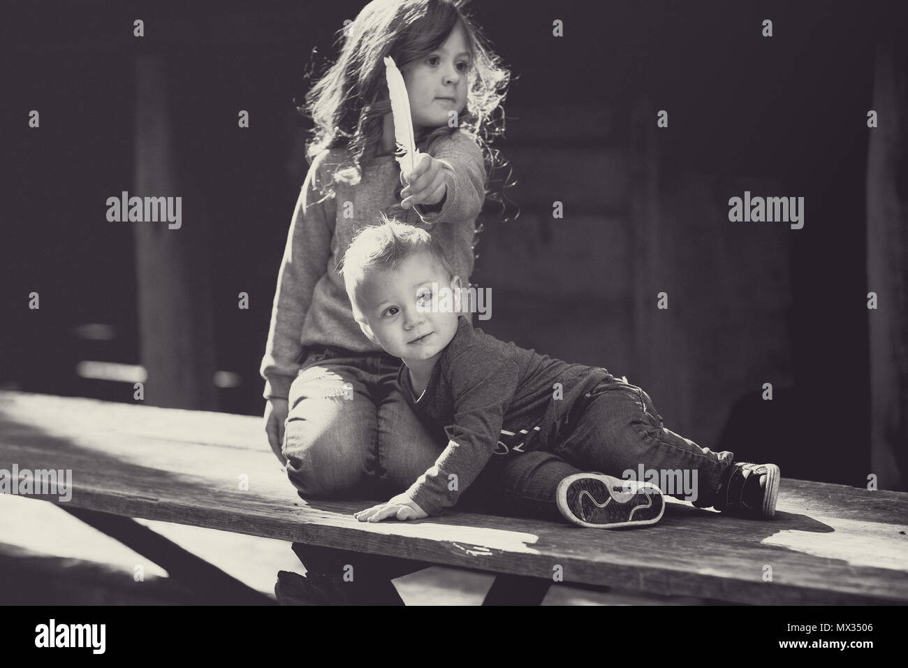 Happiness boy and girl fun outdoor under sunlight Stock Photo - Alamy