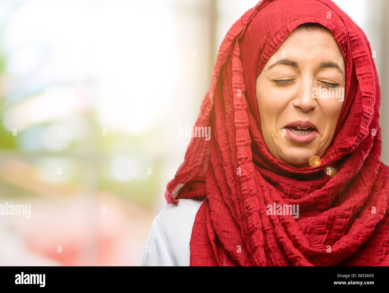 Young Arab Woman Wearing Hijab Crying Depressed Full Of Sadness Expressing Sad Emotion Stock