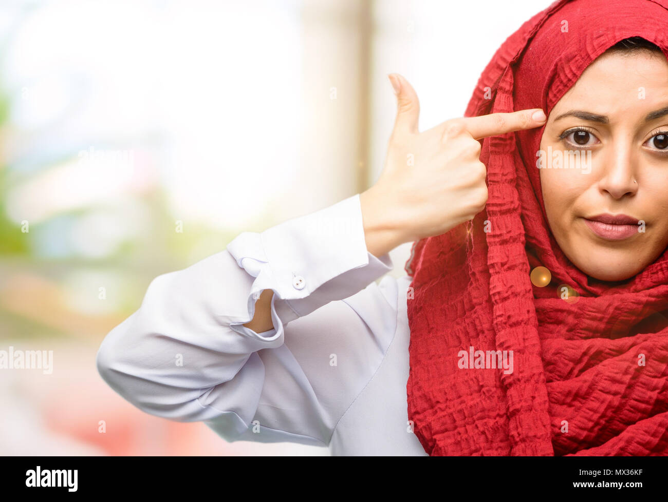 Muslim woman with gun hi-res stock photography and images - Alamy