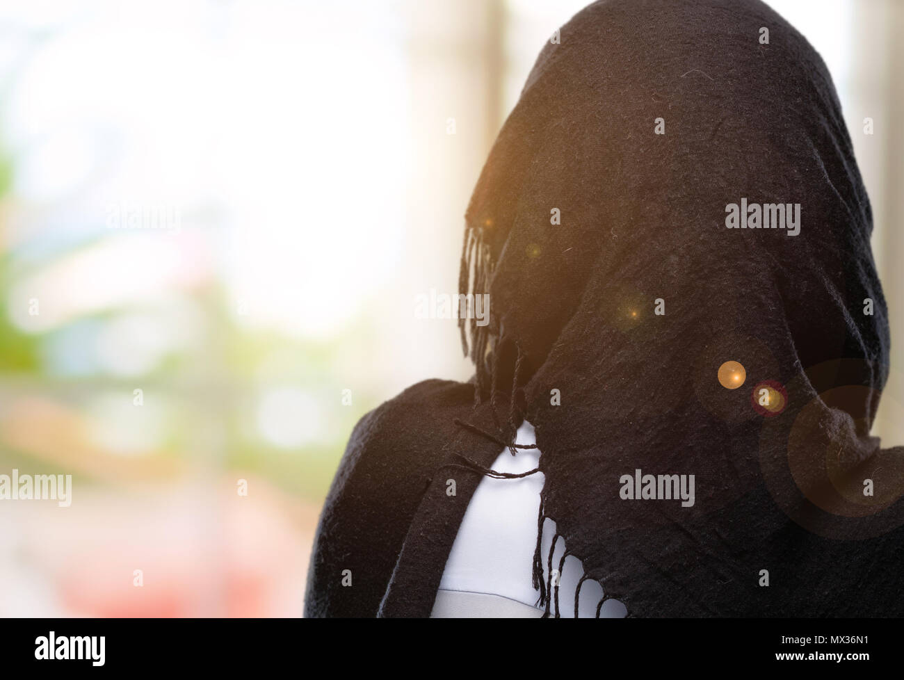 Young arab woman wearing hijab backside, rear view Stock Photo - Alamy