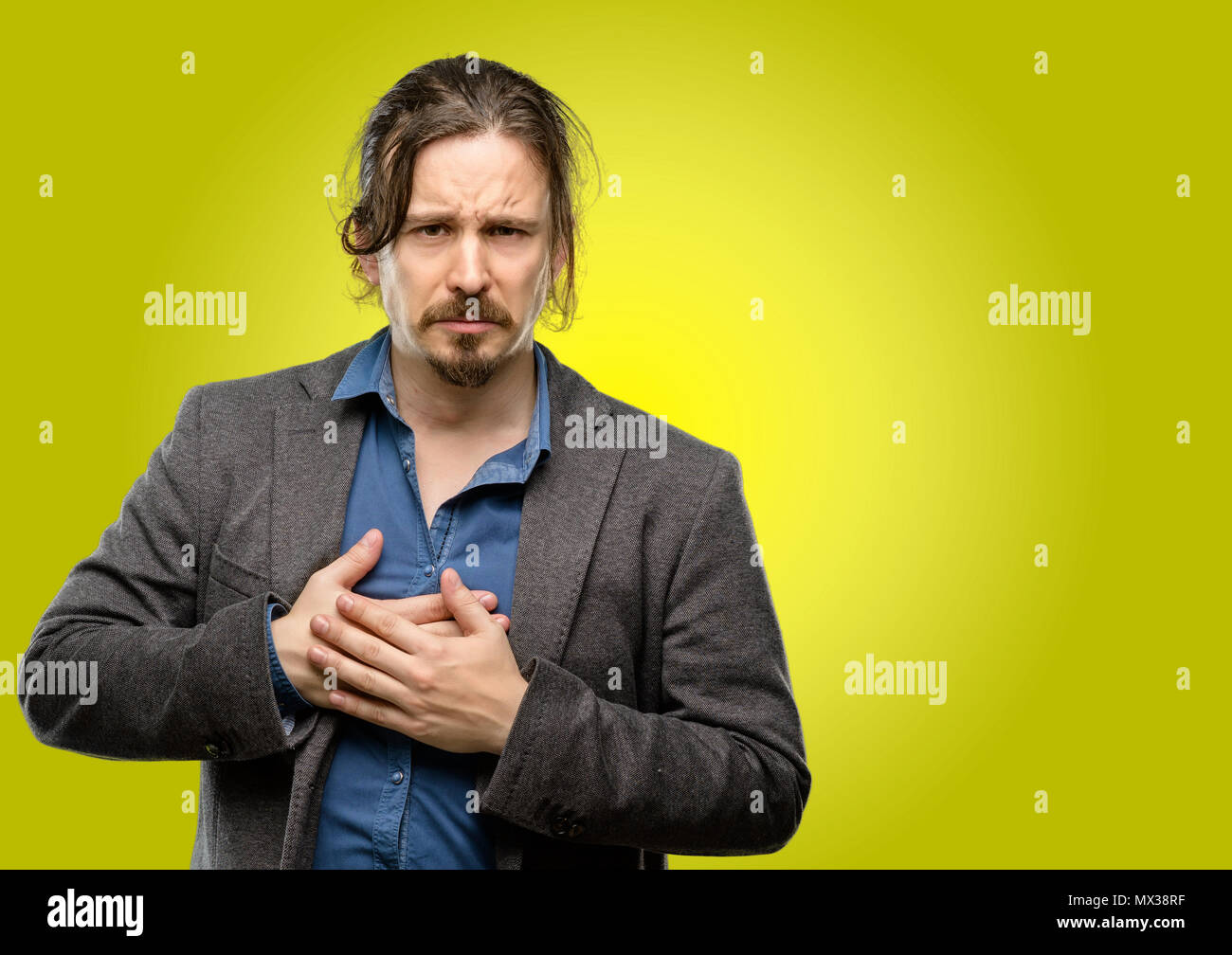 Handsome young man crying depressed full of sadness expressing sad ...