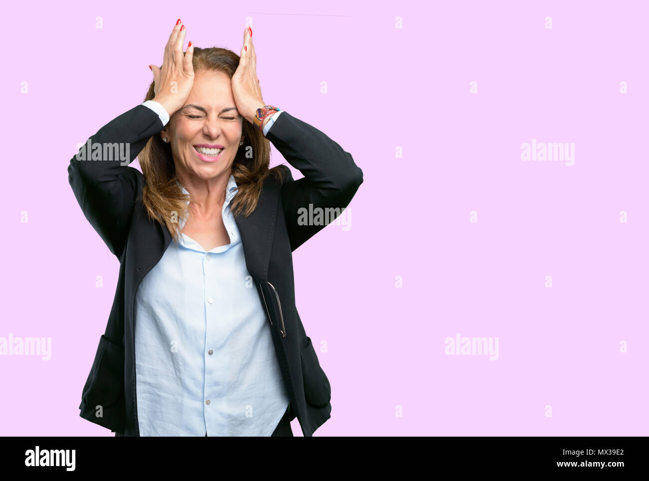 Middle age business woman terrified and nervous expressing anxiety and ...