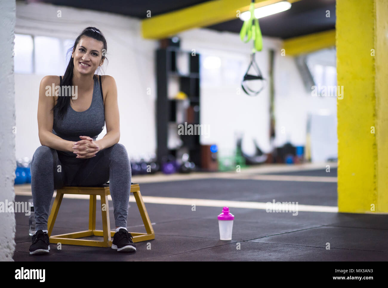 Athletic woman relaxing after cross hi-res stock photography and images ...