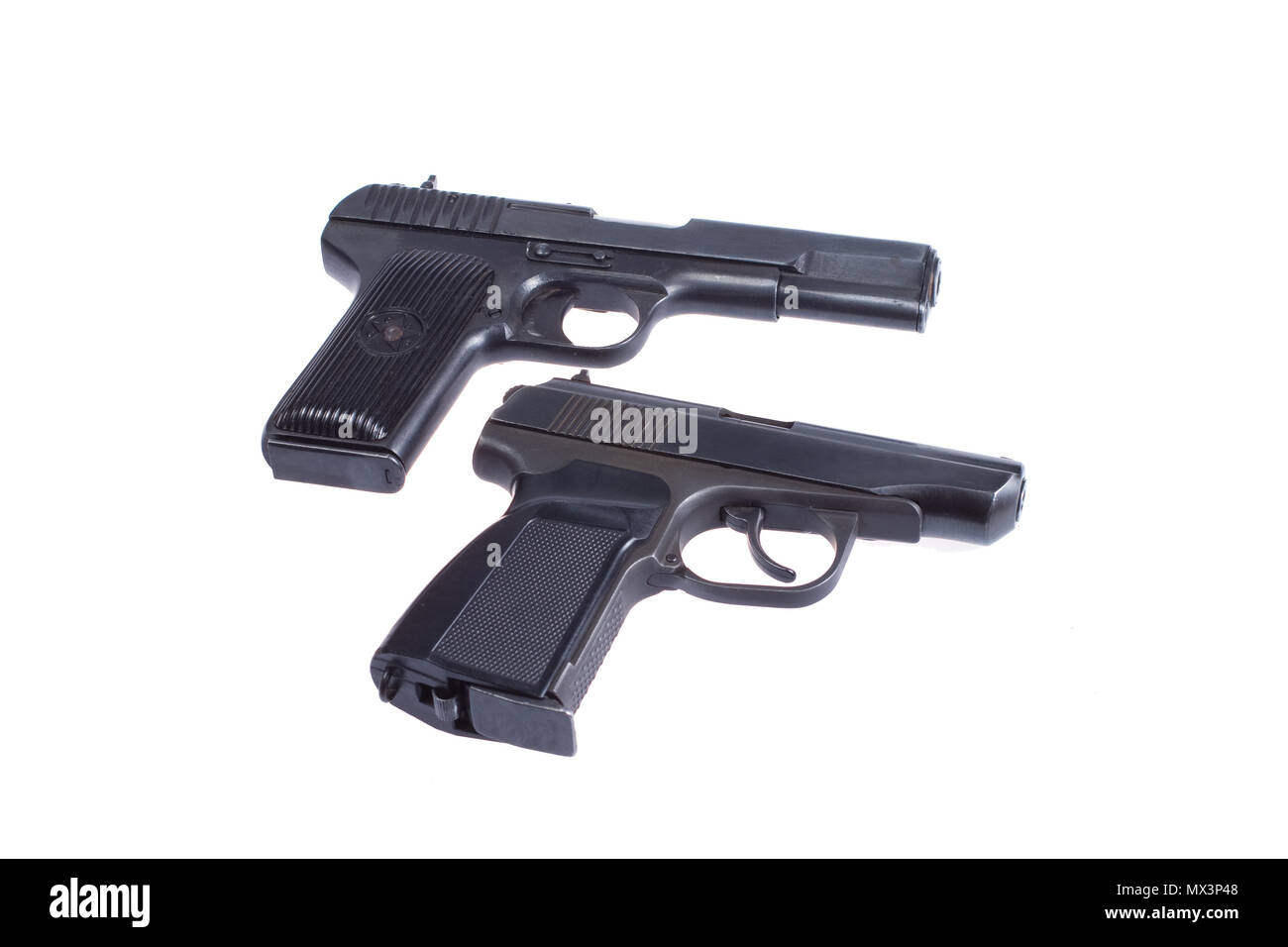 Soviet handgun TT (Tula, Tokarev) and PMM (Makarov) isolated on white ...