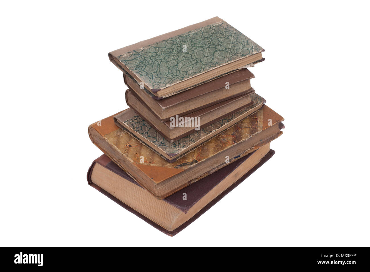 Stacked old vintage books isolated ob white Stock Photo - Alamy