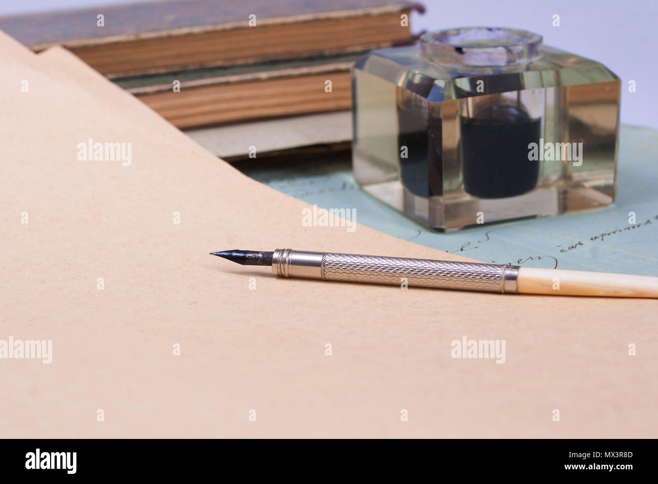 Vintage old papers, old ink pen, handwrite letters and old ink pot ...