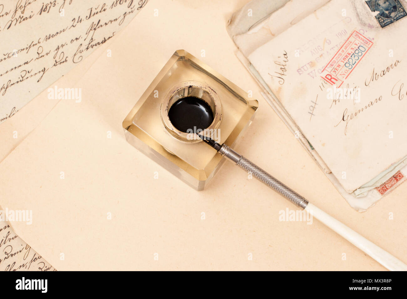 Vintage background with old paper, old ink pen, handwrite letters and ...
