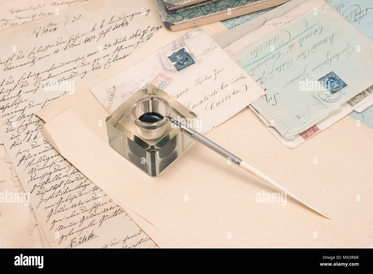 Vintage background with old paper, old ink pen, handwrite letters and ...