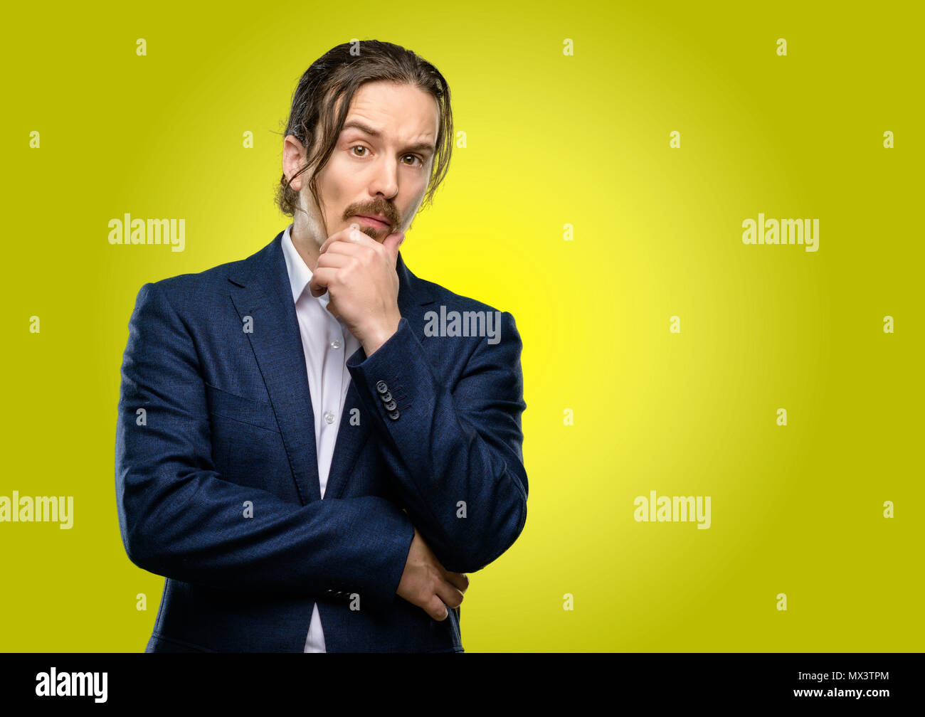 Handsome young man doubt expression, confuse and wonder concept ...