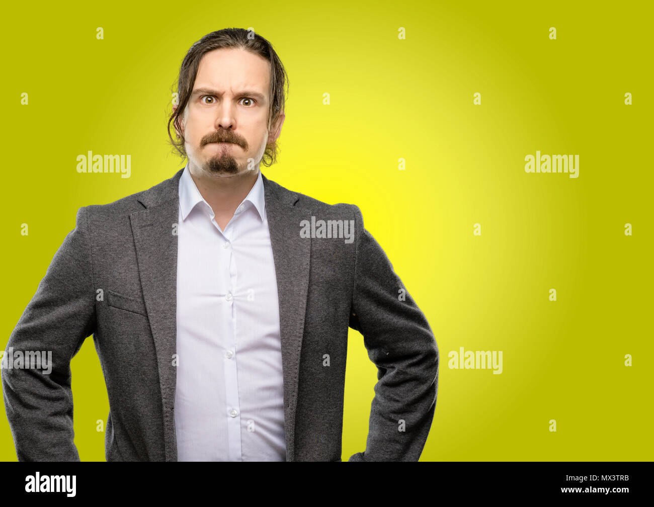 Handsome young man doubt expression, confuse and wonder concept ...