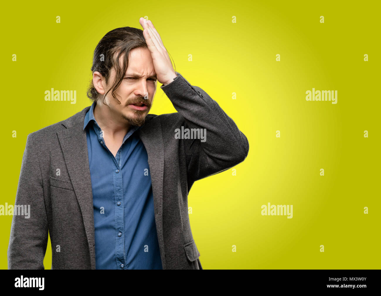 Handsome young man terrified and nervous expressing anxiety and panic ...