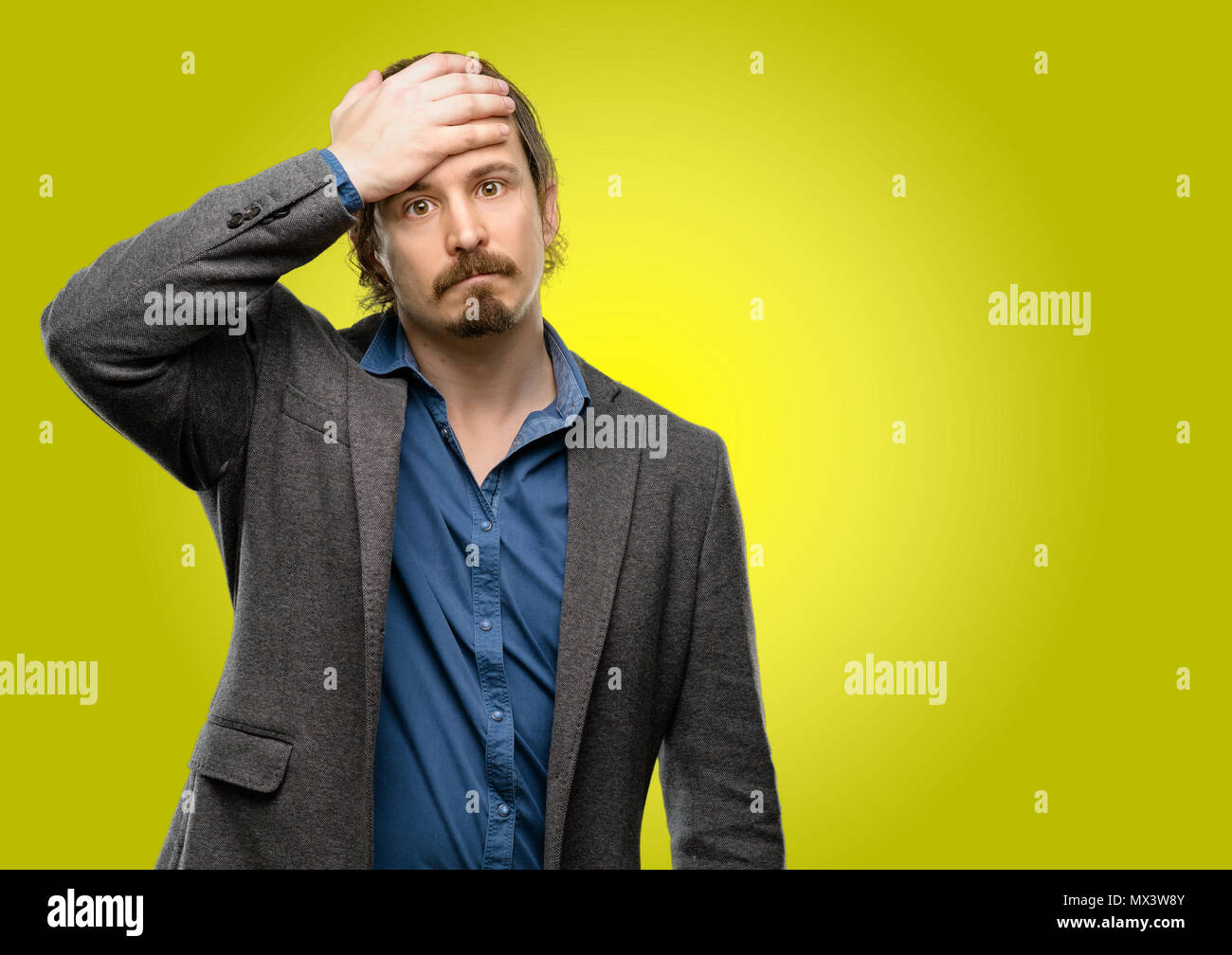 Handsome young man terrified and nervous expressing anxiety and panic ...